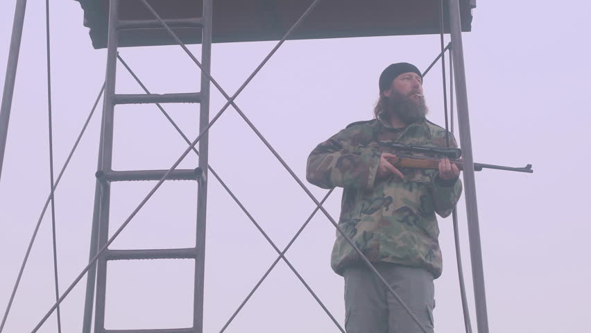 man guards tower sniper rifle standing Stock Footage Video (100% ...