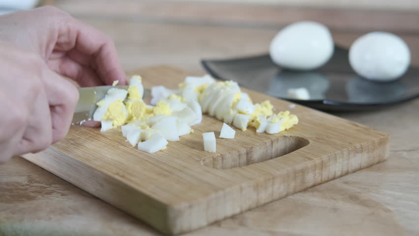 Cutting Eggs. Eggs are Cut Stock Footage Video (100% Royalty-free ...