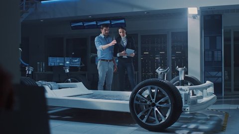 Automotive Female Professional Engineer Working On Stock Footage Video ...