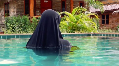 Muslim Woman Pool Black Hijab Stock Photo (Edit Now) 1349794592