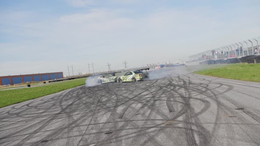 Two cars racing around the track image - Free stock photo - Public ...