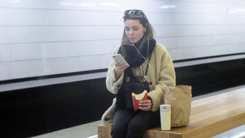 Young Woman Sitting On Bench Subway Stock Footage Video (100% Royalty ...