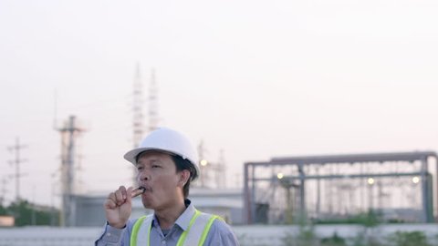 Engineers Male Smoking Ecigarette Front Power Stock Footage Video (100% ...