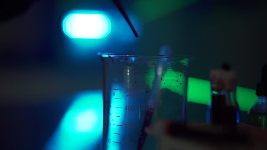 dripping liquid into beaker dropper creepy Stock Footage Video (100% ...