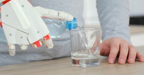 Man Robotic Prosthetic Hand Pouring Water Stock Footage Video (100% ...