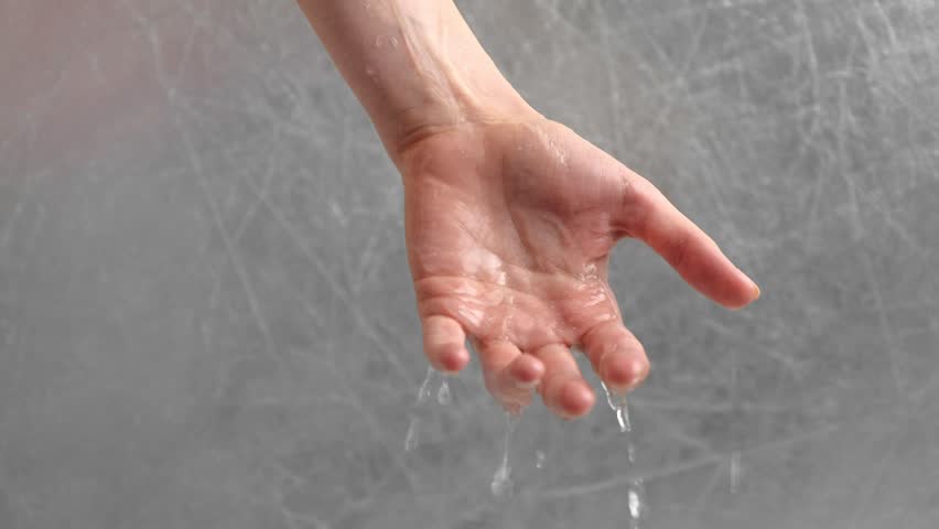 water pouring through woman's hand woman Stock Footage Video (100% ...