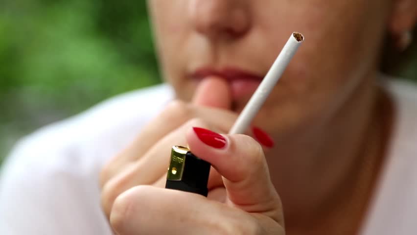 girl lights cigarette lighter Stock Footage Video (100% Royalty-free ...