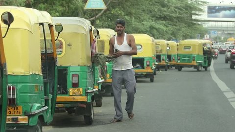 Auto Rickshaw Drivers Cleaning Their Vehicles Stock Footage Video (100% ...