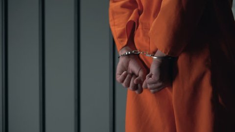 Prisoner Walking Handcuffed Arms Behind Back Stock Footage Video (100% ...