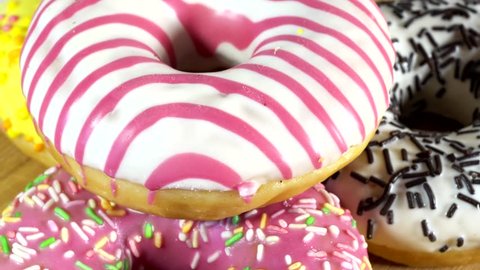 Rotating Donuts Different Fillings On Table Stock Footage Video (100% ...