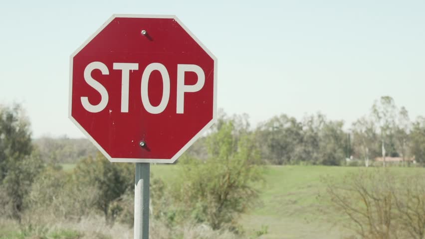 hd stop sign nature background Stock Footage Video (100% Royalty-free ...