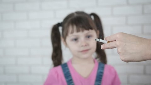 Little girl cigarette Stock Video Footage - 4K and HD Video Clips ...