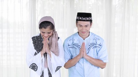 Young Muslim Couple Smiling Showing Greeting Stock Footage Video (100% ...