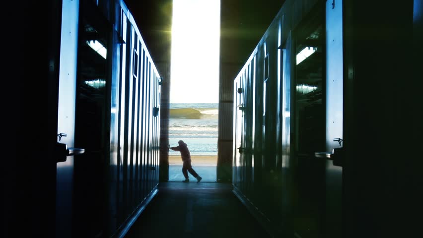 man opening gate large warehouse Stock Footage Video (100% Royalty-free ...