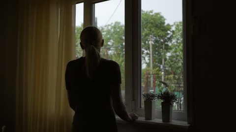 Woman Looking Through Old Window On Stock Photo (Edit Now) 211654111