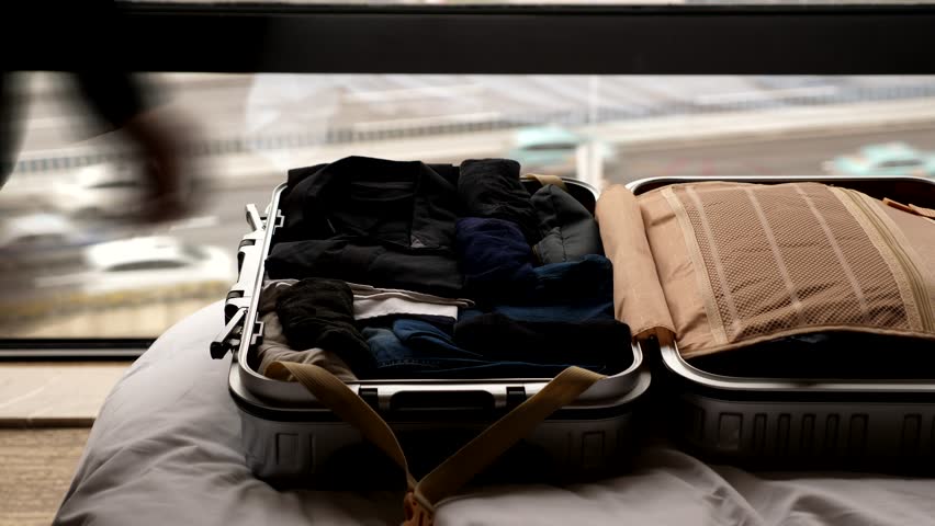 traveller quickly unpack suitcase take away Stock Footage Video (100% ...