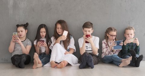 Children Using Mobile Phones Home Stock Footage Video (100% Royalty ...