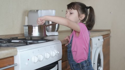 Child Boiling Water Little Girl Touches Stock Footage Video (100% ...