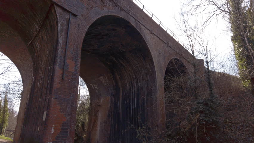 tall arched brick railway bridge over Stock Footage Video (100% Royalty ...