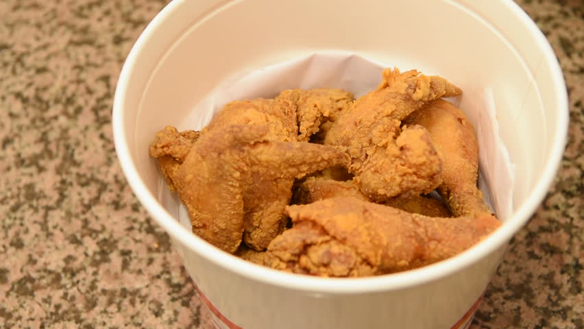 chicken broasted packing into bucket adding Stock Footage Video (100% ...