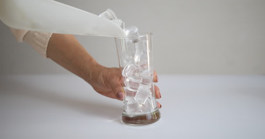 Putting Ice Cubes in Glass Stock Footage Video (100% Royalty-free ...
