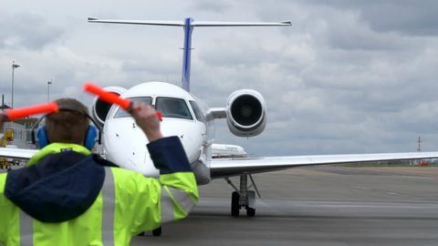 Airport Ground Crew Aircraft Marshal Signalling Stock Footage Video ...