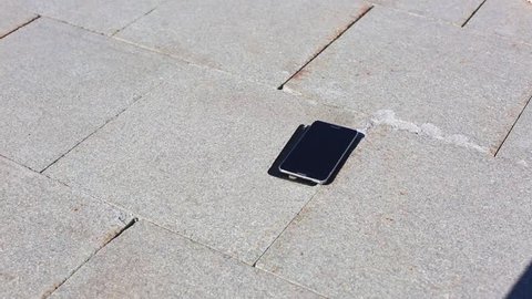 Mobile Phone Falling On Ground Splits Stock Footage Video (100% Royalty ...