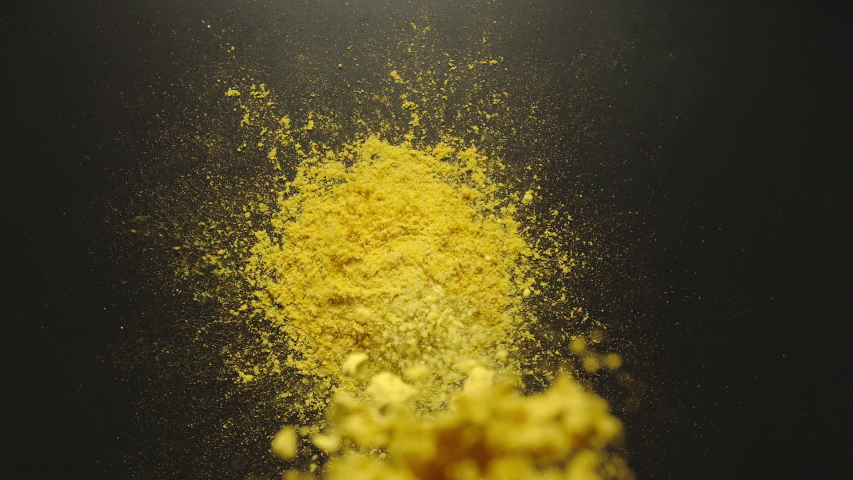 slow motion yellow turmeric powder pouring Stock Footage Video (100% ...