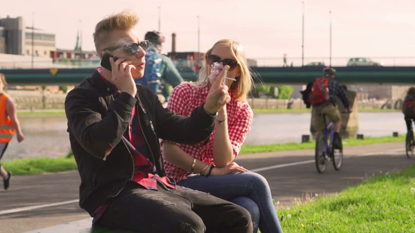 couple smoking cigarettes man talking on Stock Footage Video (100% ...