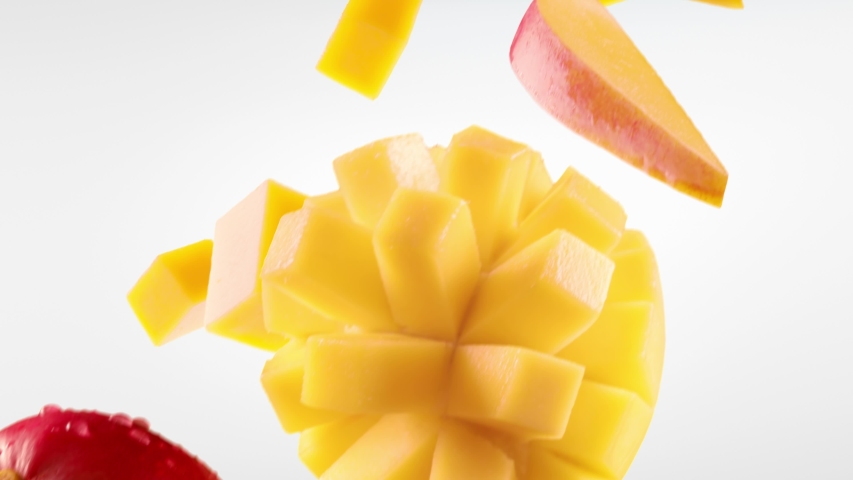 mango slices falling on white background Stock Footage Video (100% ...