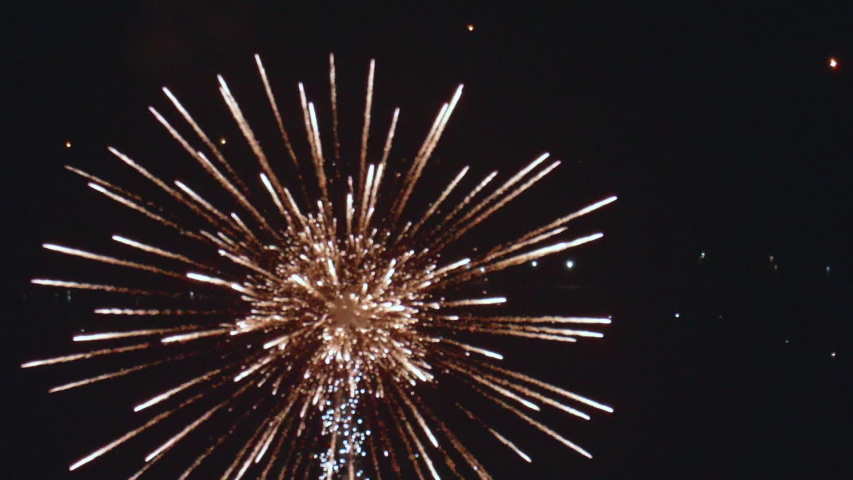 firework spiraling exploding glittery embers tilt Stock Footage Video ...