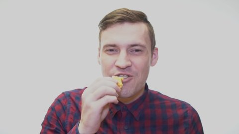 Man Eating Chicken Nuggets On White Stock Footage Video (100% Royalty ...