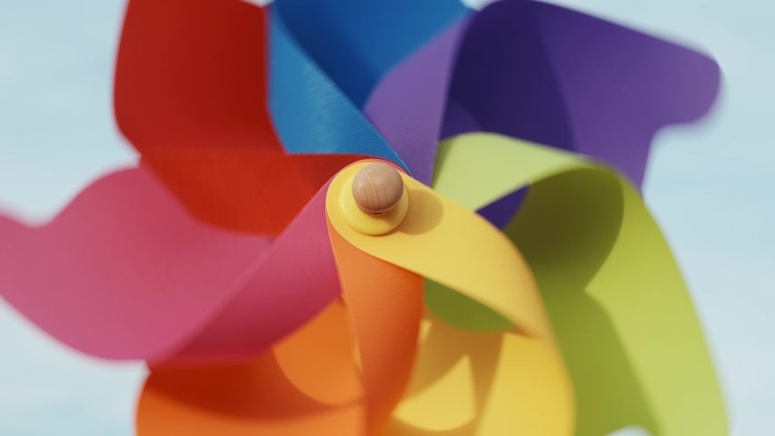rotating multi-colored plastic pinwheel blowing wind Stock Footage ...