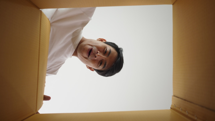 man unpacking take product inside box Stock Footage Video (100% Royalty ...