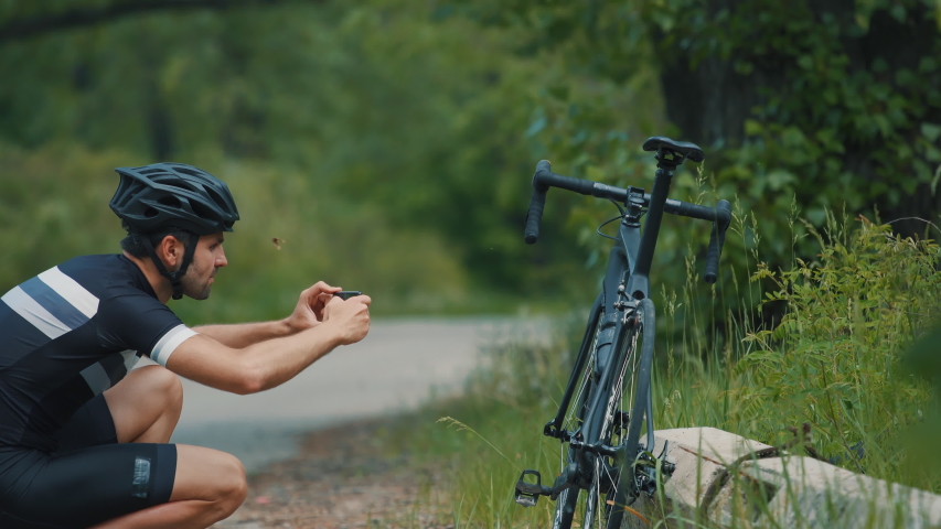 cyclist taking photo his bicycle photograph Stock Footage Video (100% ...