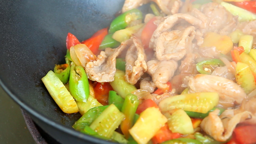 cooking sweet sour fried pork pad-prew-wan Stock Footage Video (100% ...