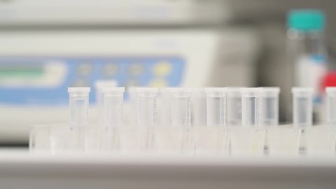 scientist hand shaking test tube red Stock Footage Video (100% Royalty ...