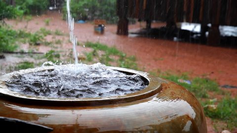 Rain Water Falling Into Clay Pot Stock Footage Video (100% Royalty-free ...