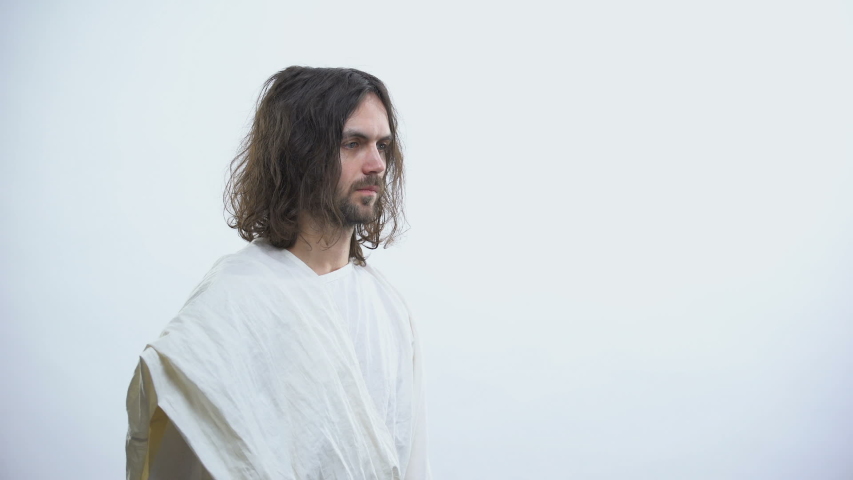 jesus raising hands illuminated light resurrection Stock Footage Video ...