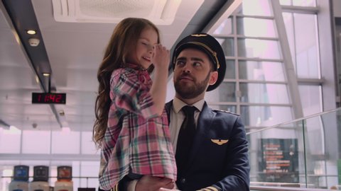 Pilot Hugging Little Smiling Daughter Showing Stock Footage Video (100% ...