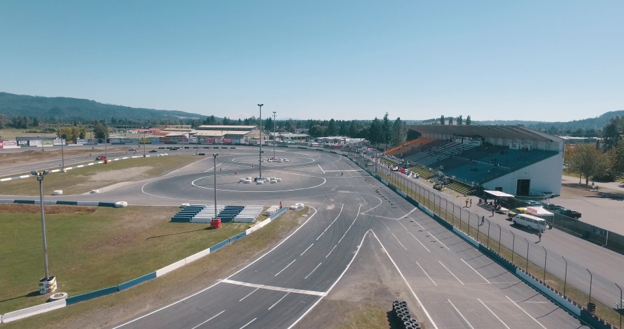 Race Cars racing around the track image - Free stock photo - Public ...