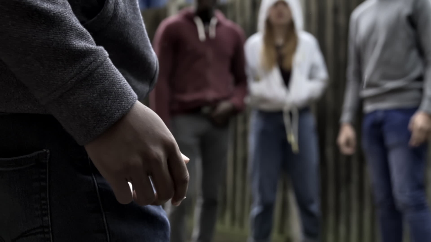 teenage boy being taunted by gang Stock Footage Video (100% Royalty ...