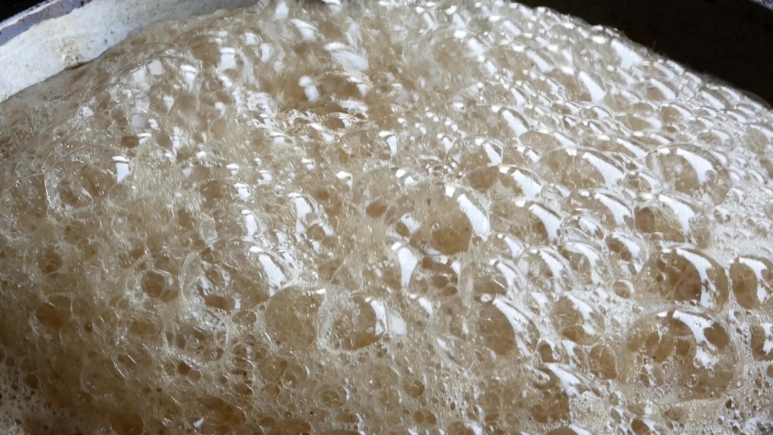 close boiling cooking oil foaming hot Stock Footage Video (100% Royalty ...