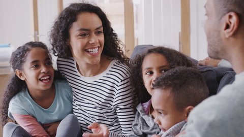 Family Taking Break Sitting On Sofa Stock Footage Video (100% Royalty ...