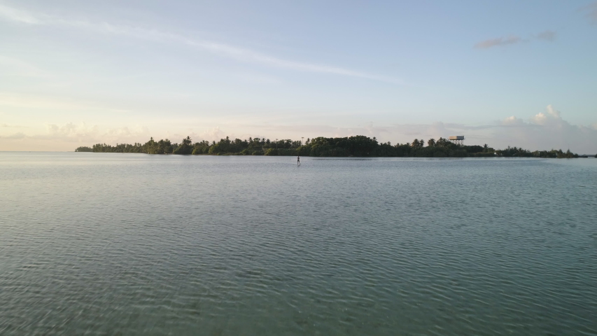 flying over maldives ocean man stand Stock Footage Video (100% Royalty ...