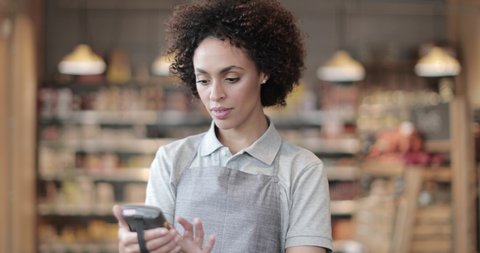 Sales Assistant Food Market Using Scanner Stock Footage Video (100% ...