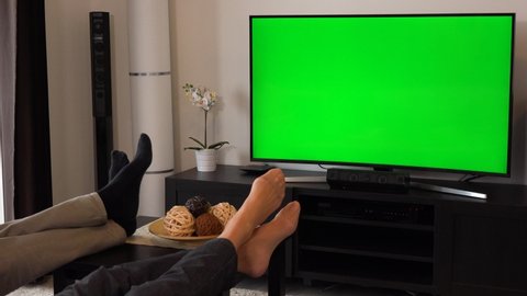 Couple Watches Tv Green Screen Legs Stock Footage Video (100% Royalty ...