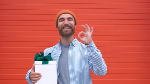 Cheerful Smiling Young Man Catching Gift Stock Footage Video (100% ...