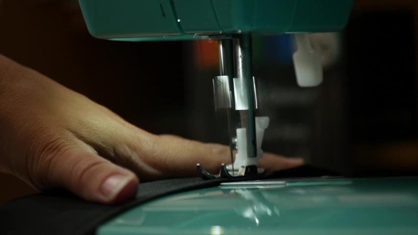 Female Hand Pushes Material Through Sewing: video de stock (totalmente ... Female Hand Pushes Material Through Sewing: video de stock (totalmente ...