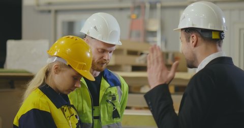 Two Upset Factory Workers Listening Their Stock Footage Video (100% ...